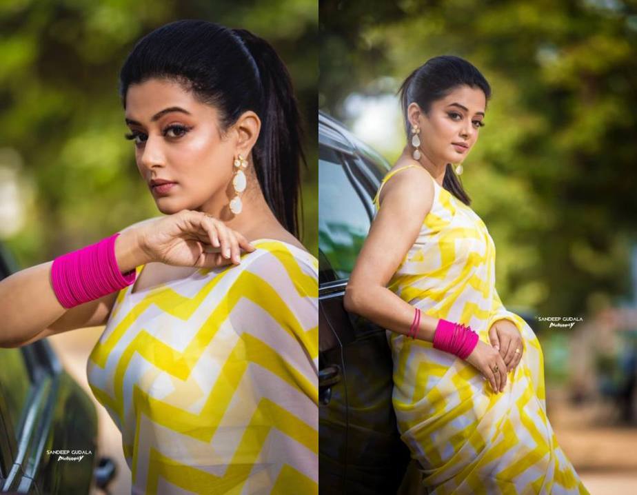Priyamani styles her bright saree with a contrast accessory, check it out!