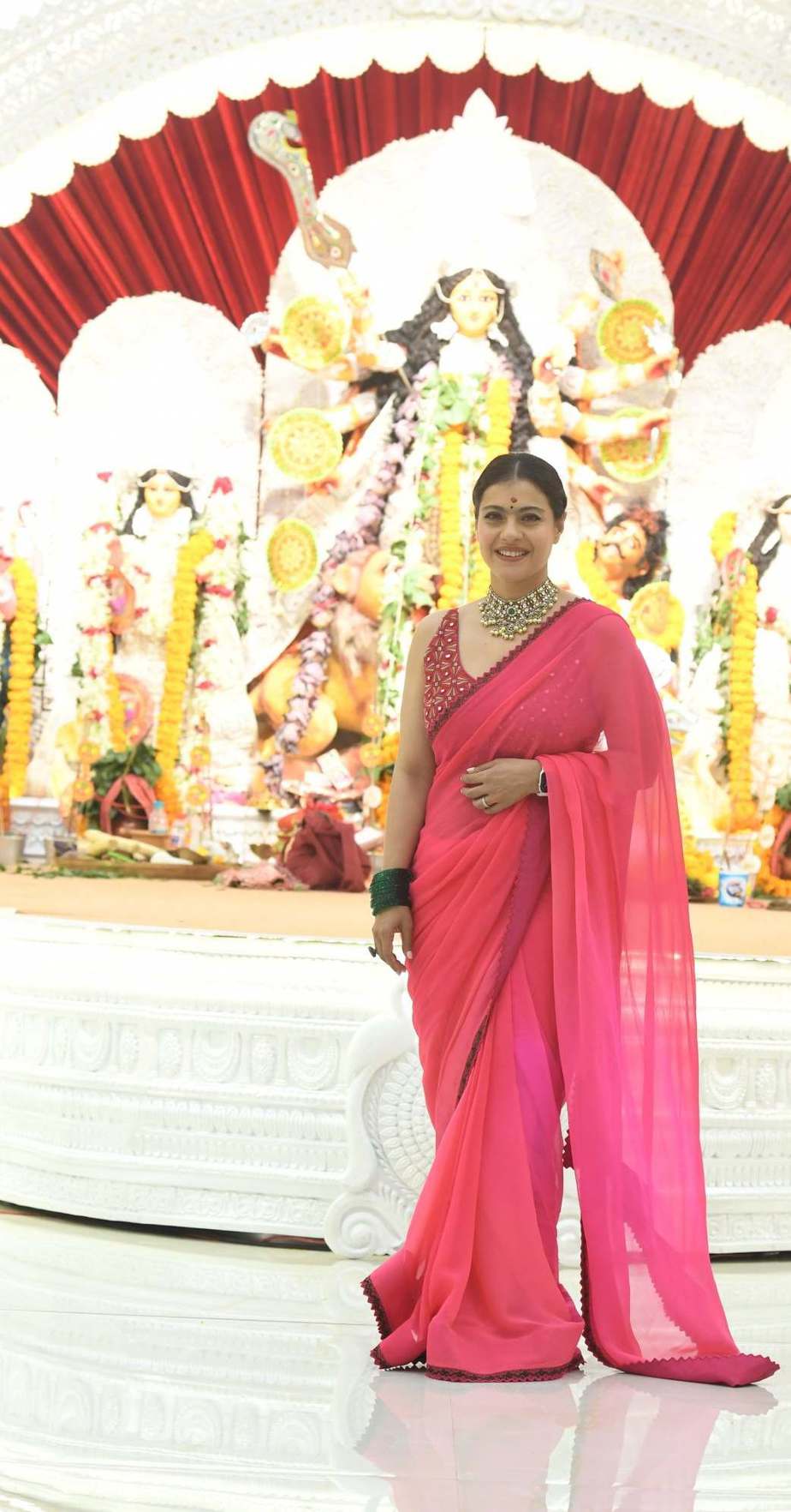 Kajol looks stunning in a pink saree for Durga Puja celebrations!