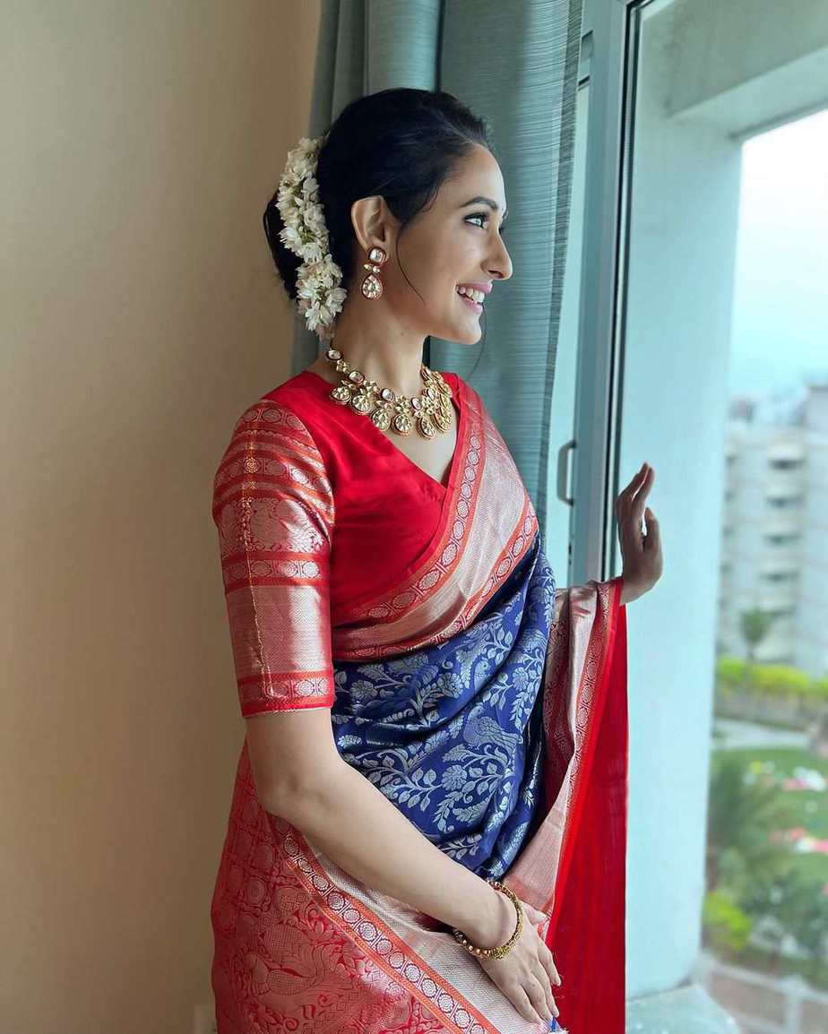 Pragya Jaiswal glows in a navy blue pattu saree for a shop opening!
