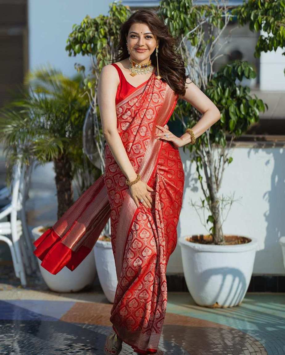 Kajal Aggarwal dresses up in a red traditional saree for her baby shower!