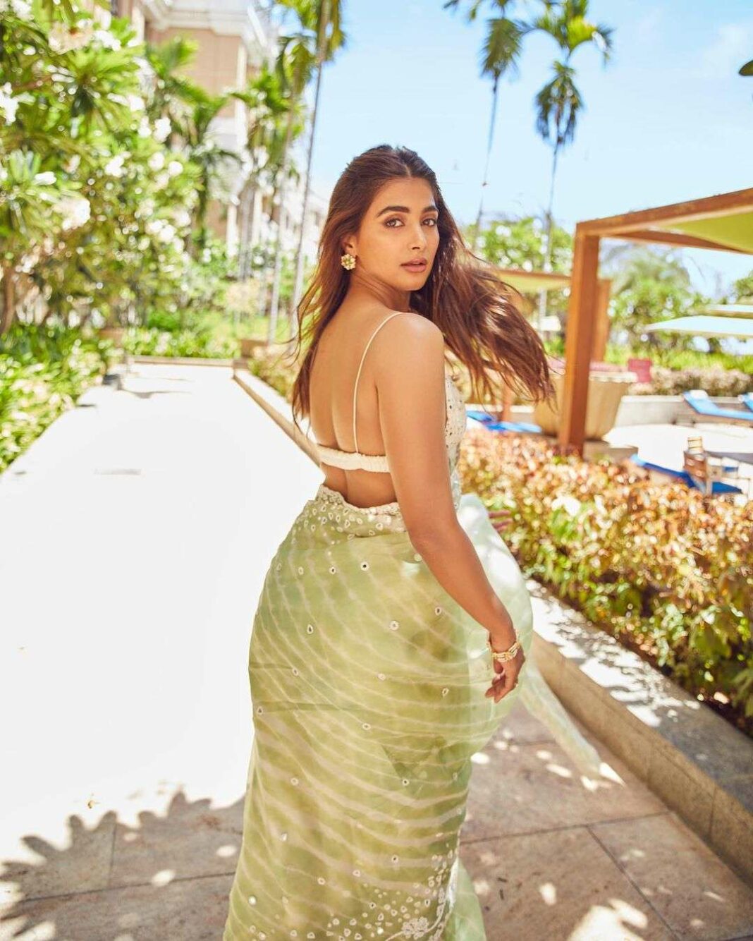 Pooja Hegde looks elegant in an organza leheriya saree for "Beast ...