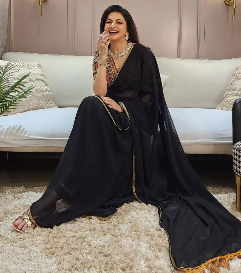 Bhagyashree looks beautiful in a black sheer saree and embroidered blouse!