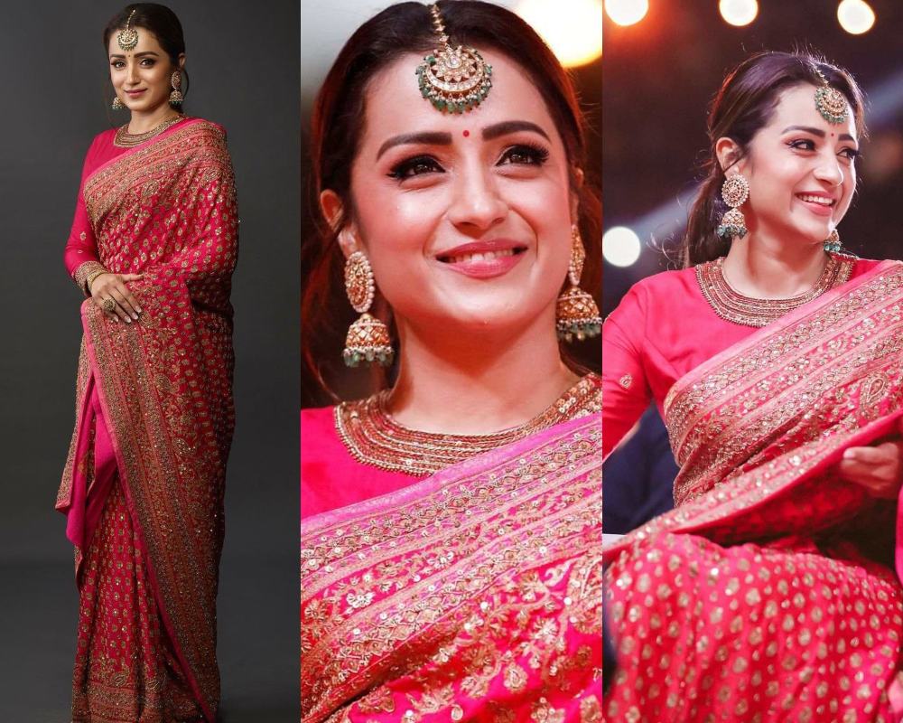 Trisha Krishnan glams up in a pink embroidered saree at "Ponniyin ...