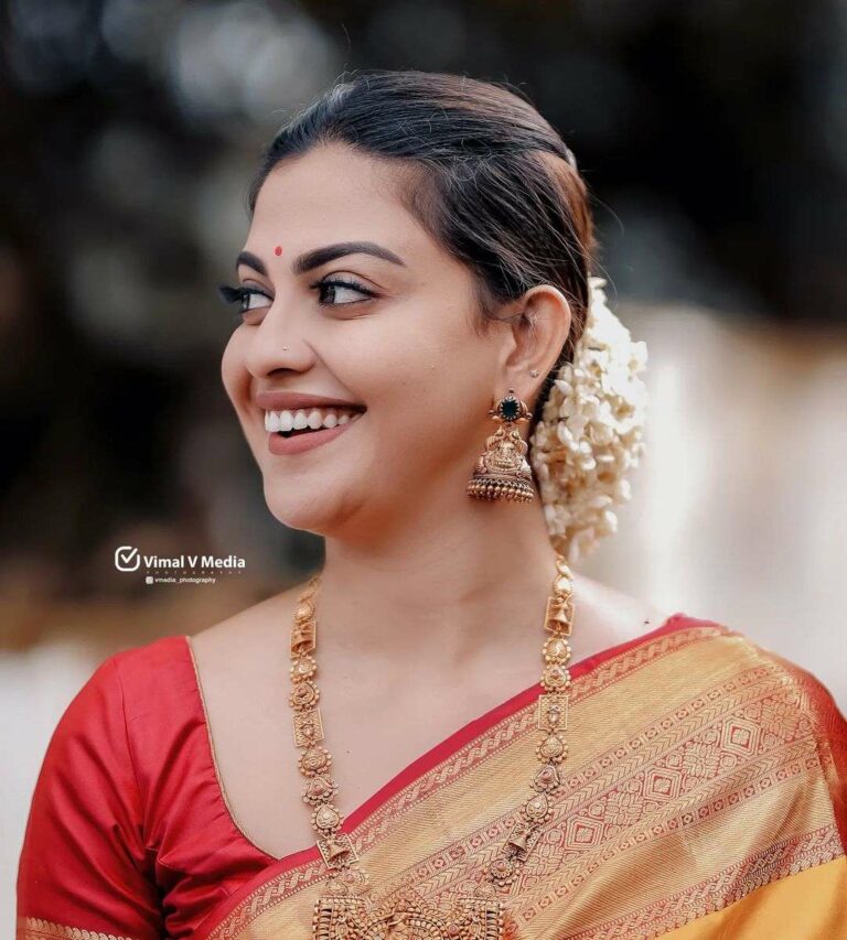 Anusree Nair Opts For A Yellow Kanchipuram Saree For A Wedding