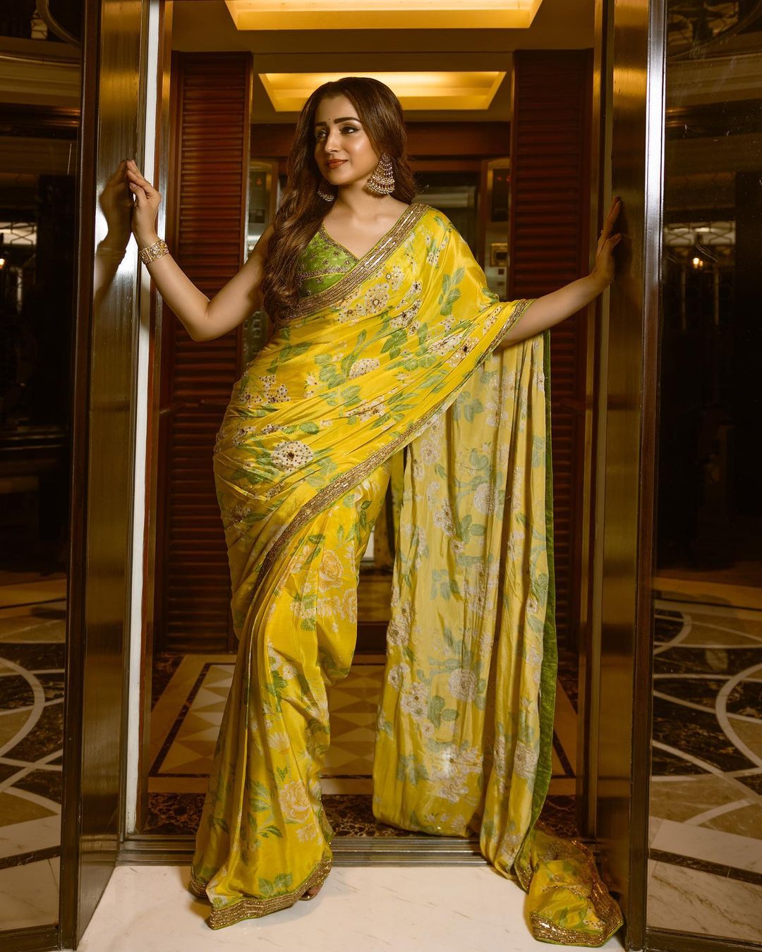 Stunning in Green: Trisha Krishnan in Floral Saree at PS 2 Promotions!