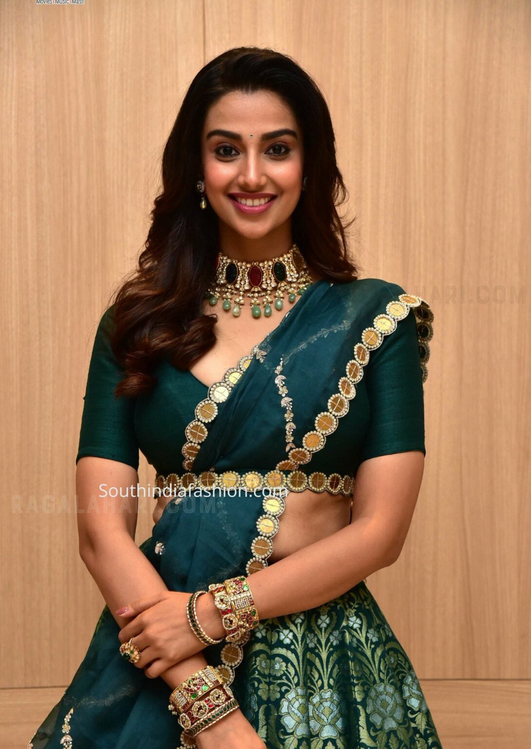 Meenakshi Chowdary Stuns in Green Half Saree at Hatya Movie Pre-release ...