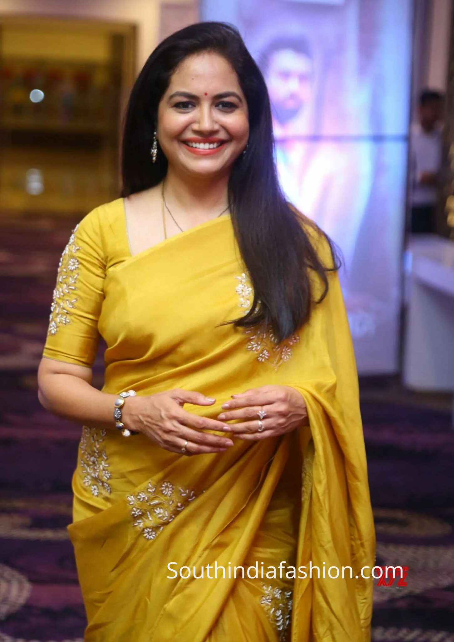 Singer Sunitha Shines in Mustard Yellow Elegance at Sarkaru Naukri ...